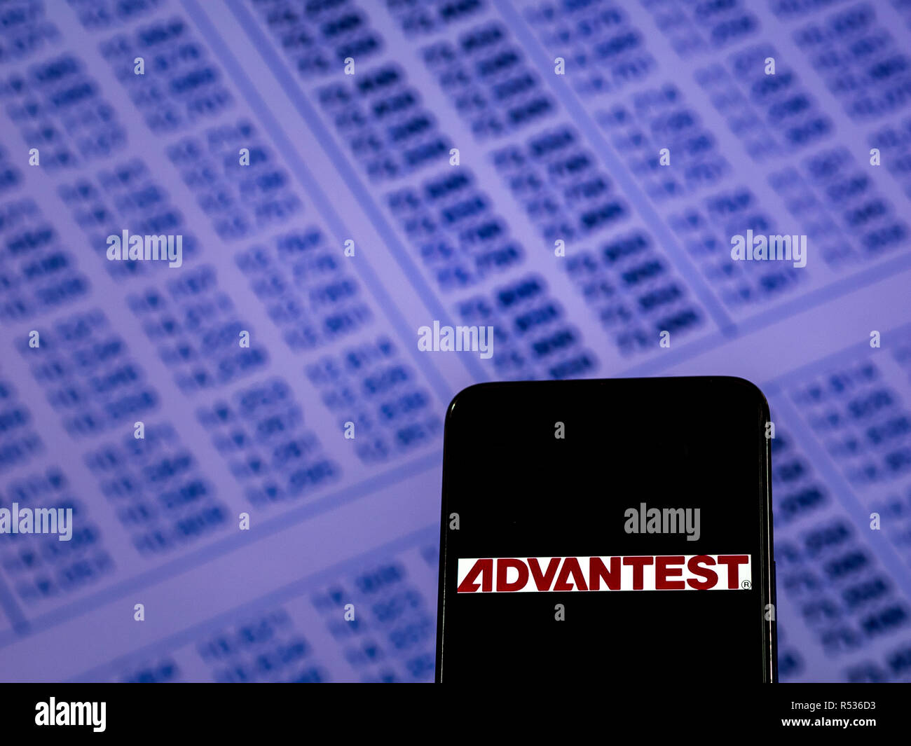 Advantest Corporation logo seen displayed on smart phone Stock Photo ...