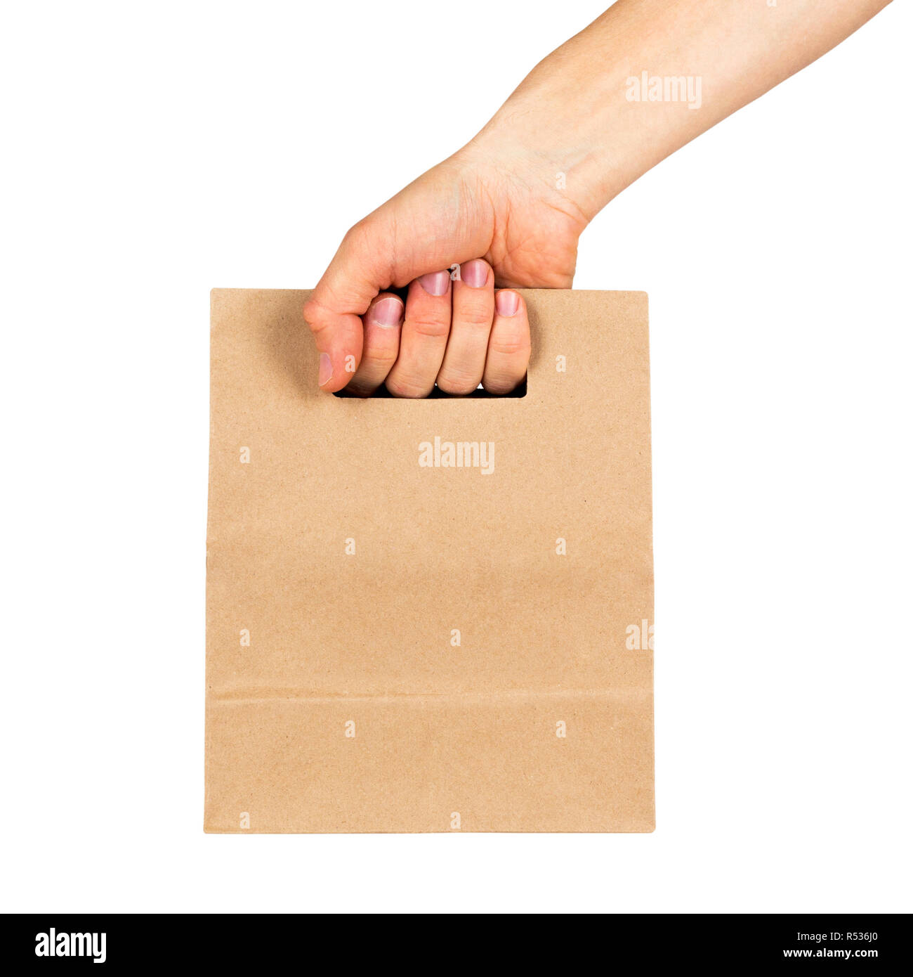 Hand holding brown paper bag hi-res stock photography and images - Alamy