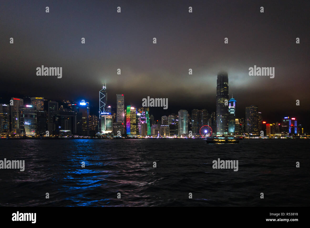 Night view of Hong Kong Central skyline with the top of skyscrapers ...