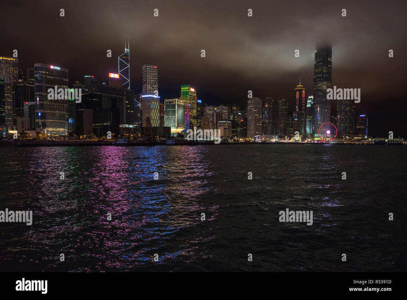 Hong Kong Central night cityscape viewed from Golden Bauhinia Square ...