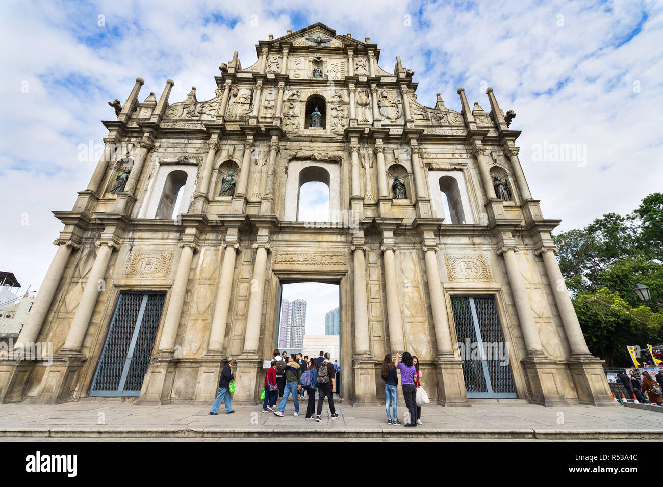 Tourists visiting the Ruins of St. Paul's cathedral, part of UNESCO ...