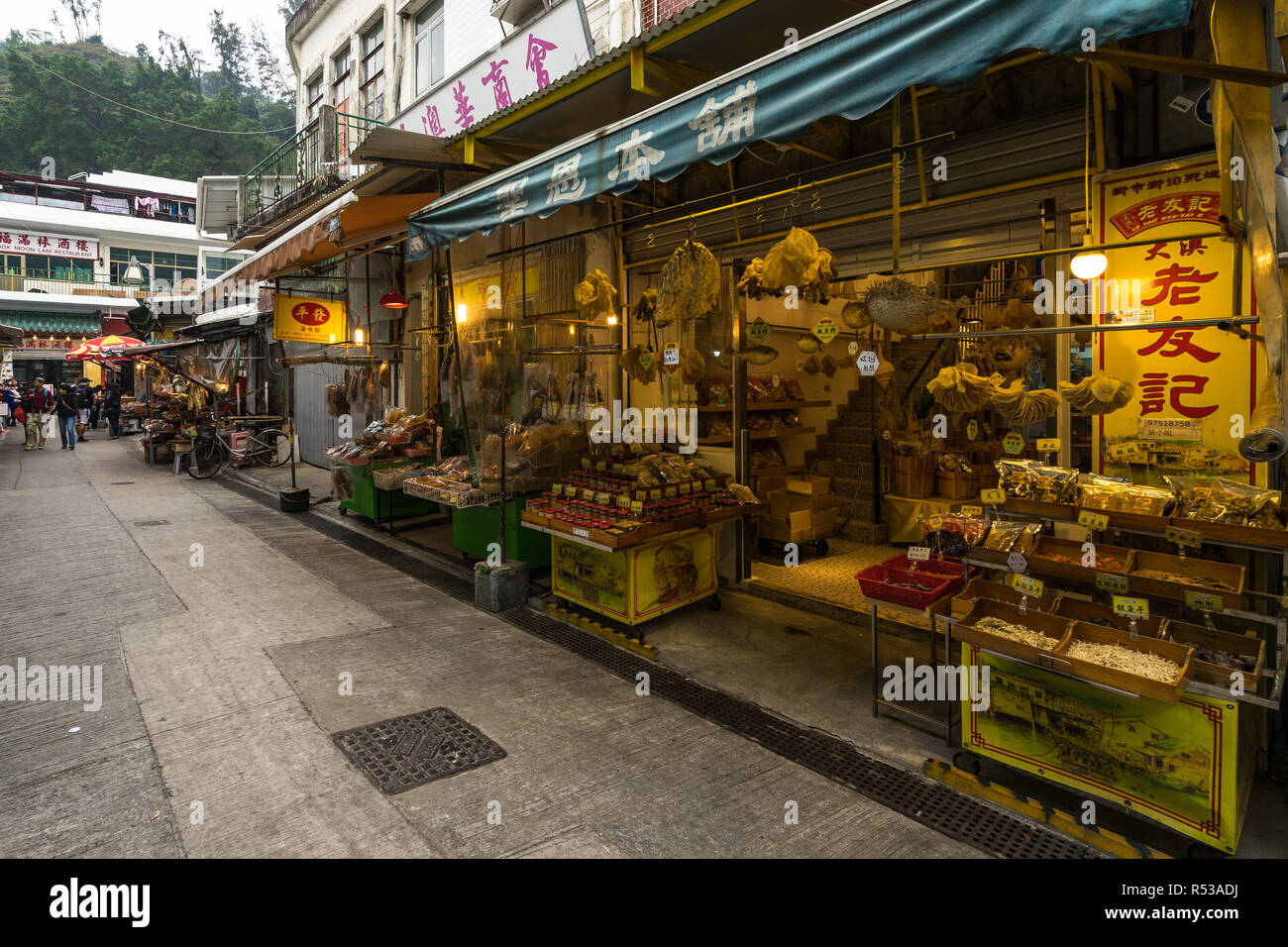 Market street at Tai O fishing village, with shops selling dry seafood ...