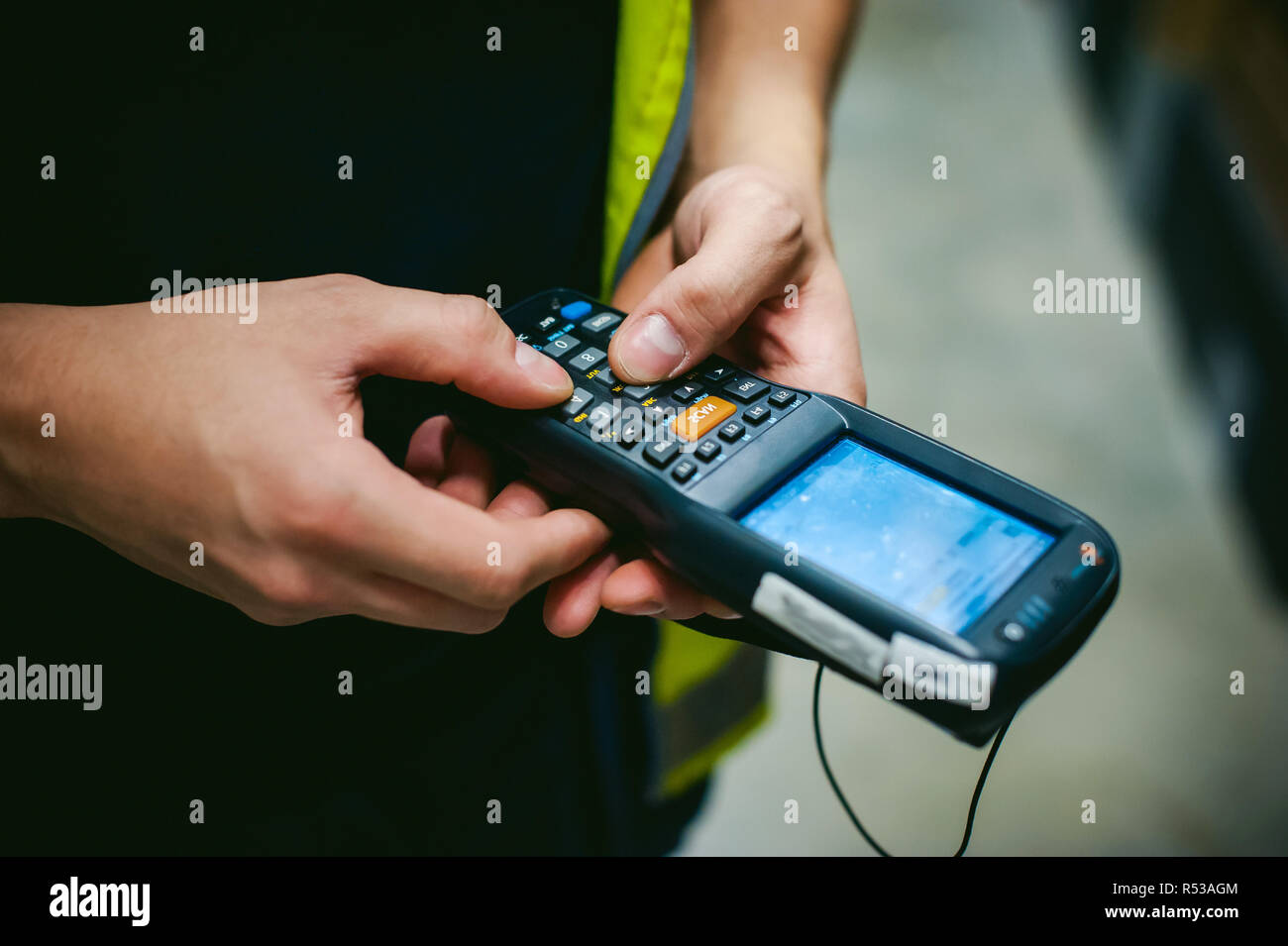 Worker Checking and Scanning Package by tablet handheld In Warehouse ...