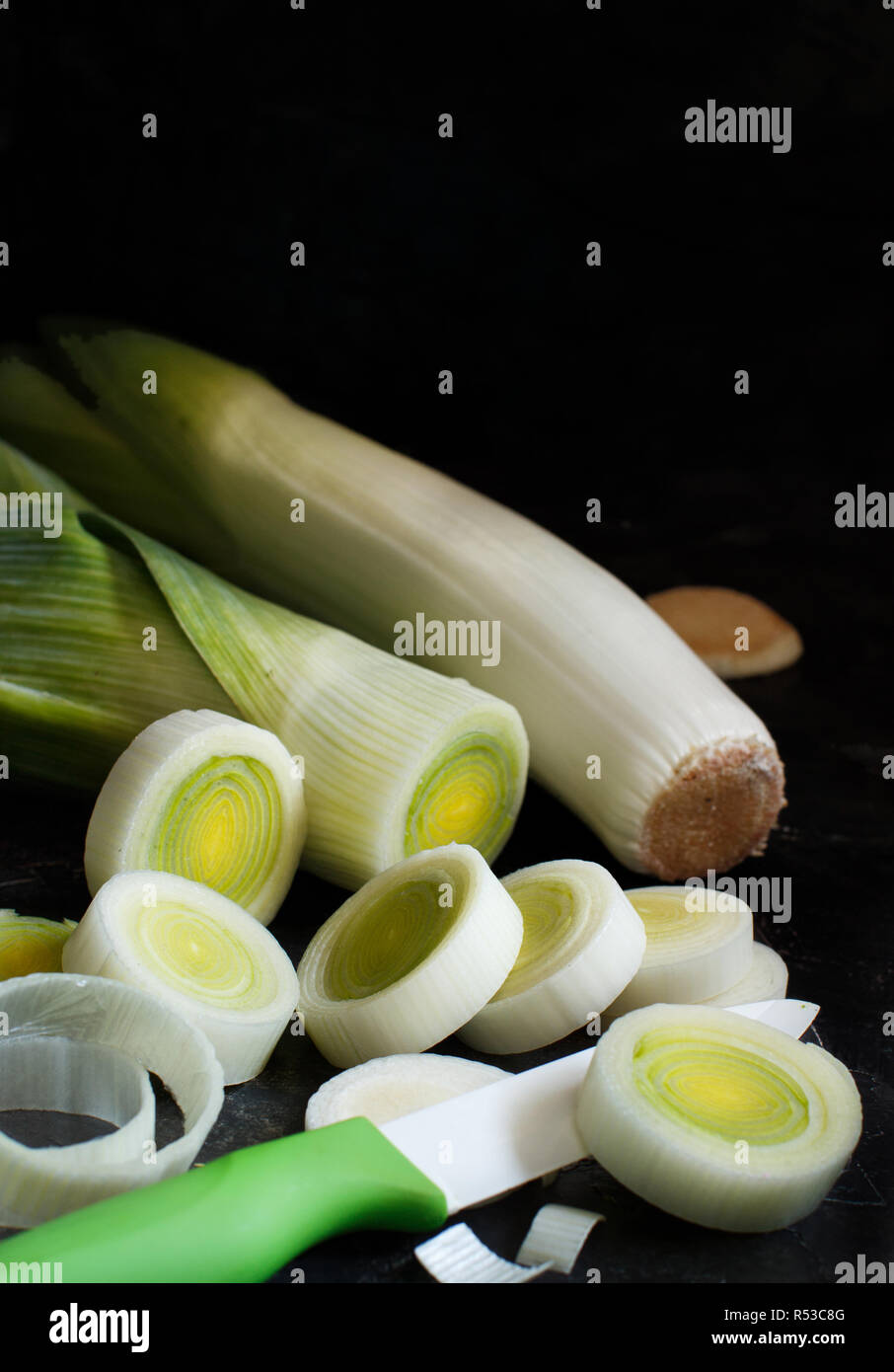 Fresh leeks whole and sliced Stock Photo - Alamy