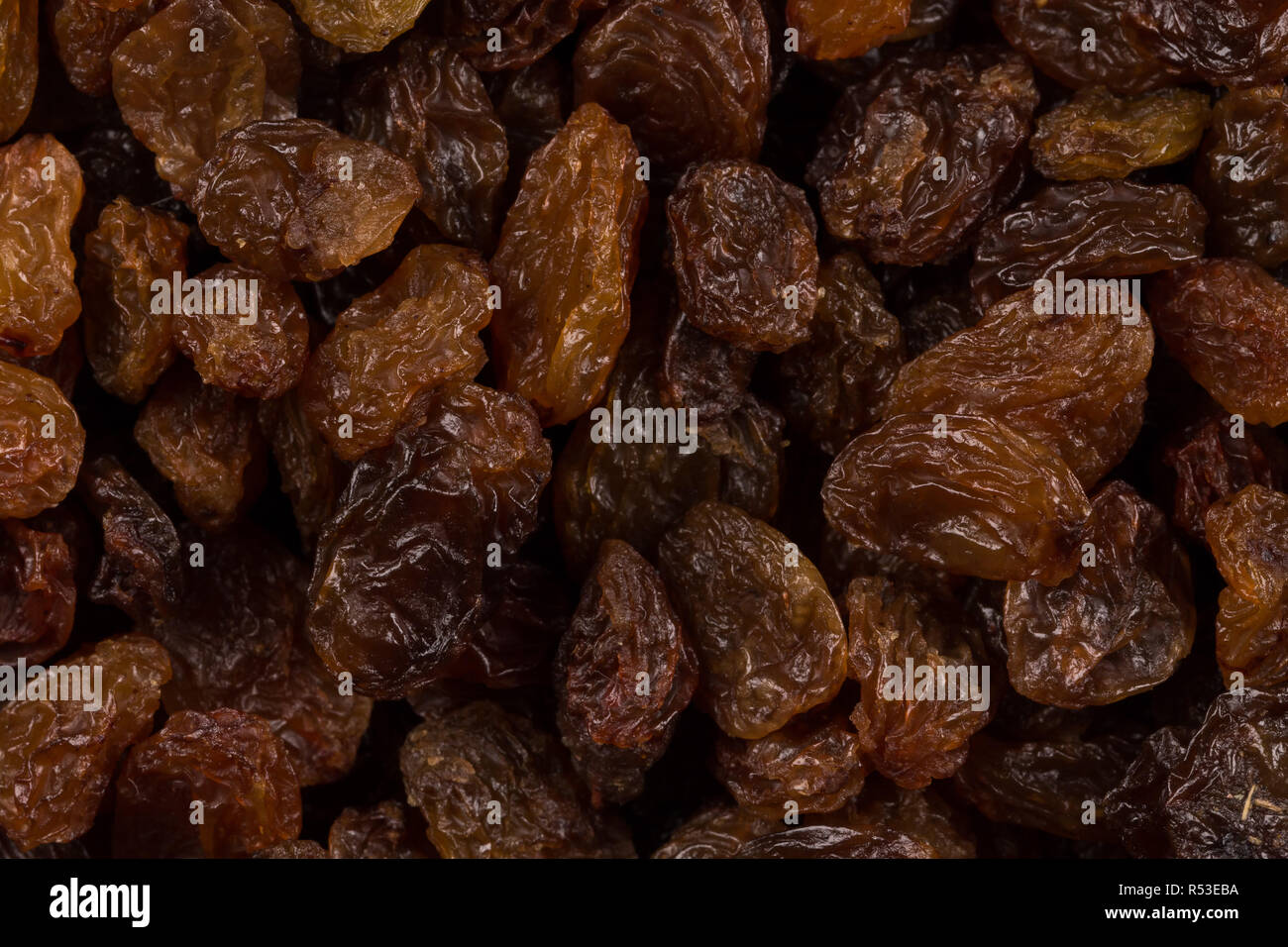 Sweet raisins background Stock Photo - Alamy