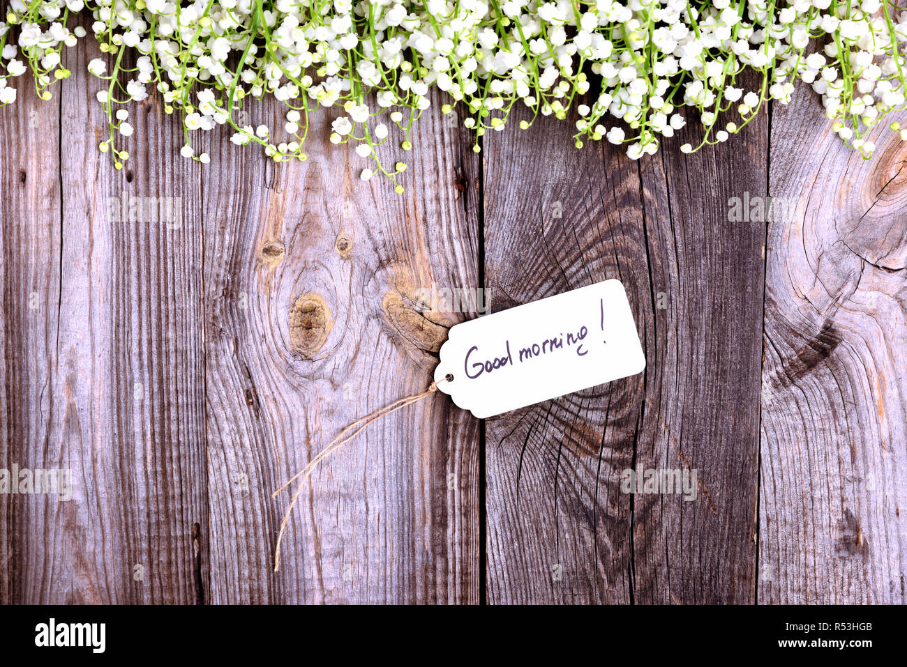 Paper tag on a rope with an inscription good morning Stock Photo - Alamy