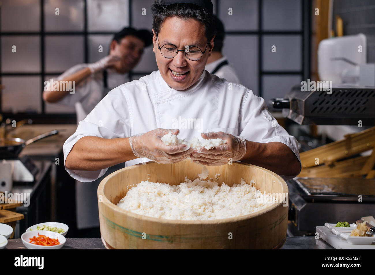 Asian man cooking fried rice hi-res stock photography and images - Alamy