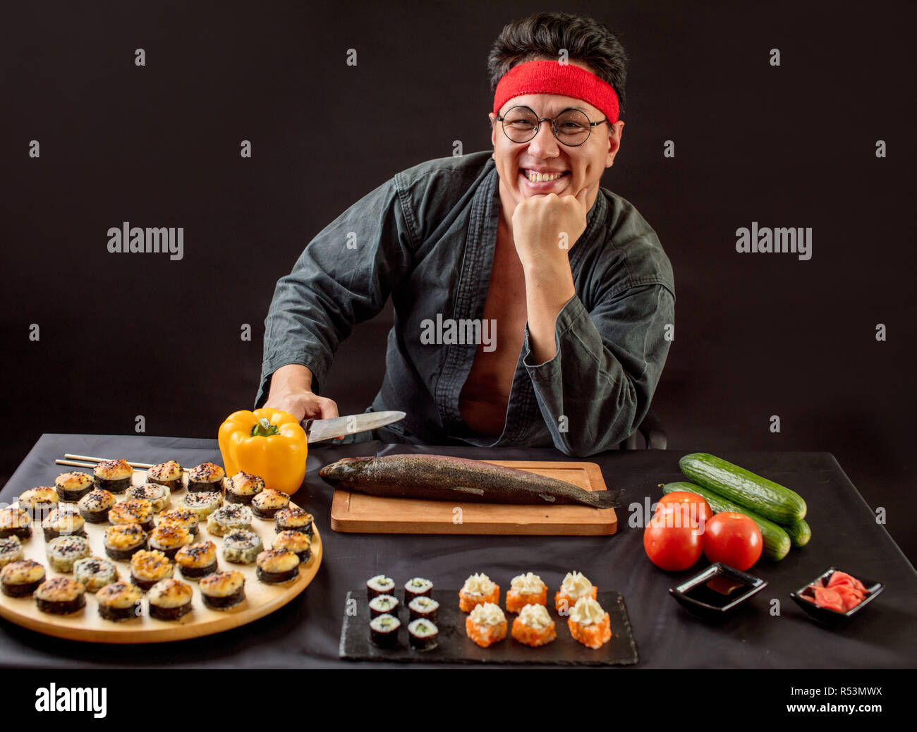 positive chef resting after working day Stock Photo - Alamy