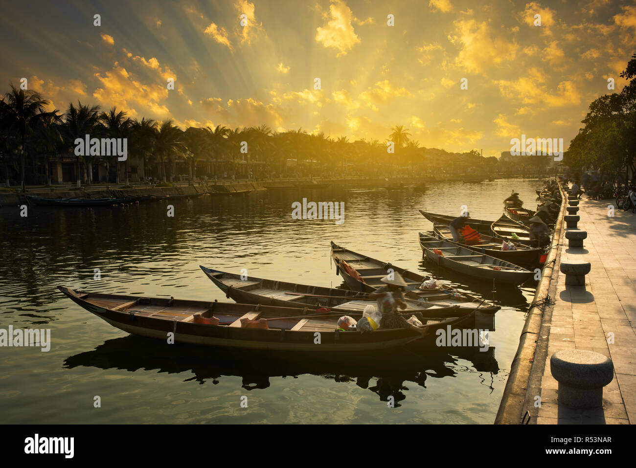 Wooden boats on the Thu Bon River in Hoi An Ancient Town, Vietnam Stock ...