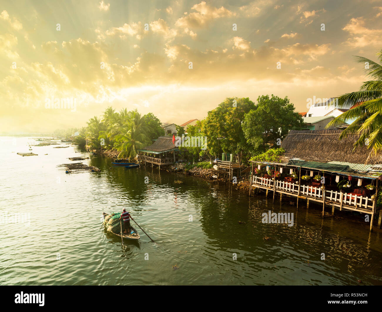 Wooden boats on the Thu Bon River in Hoi An Ancient Town, Vietnam Stock ...