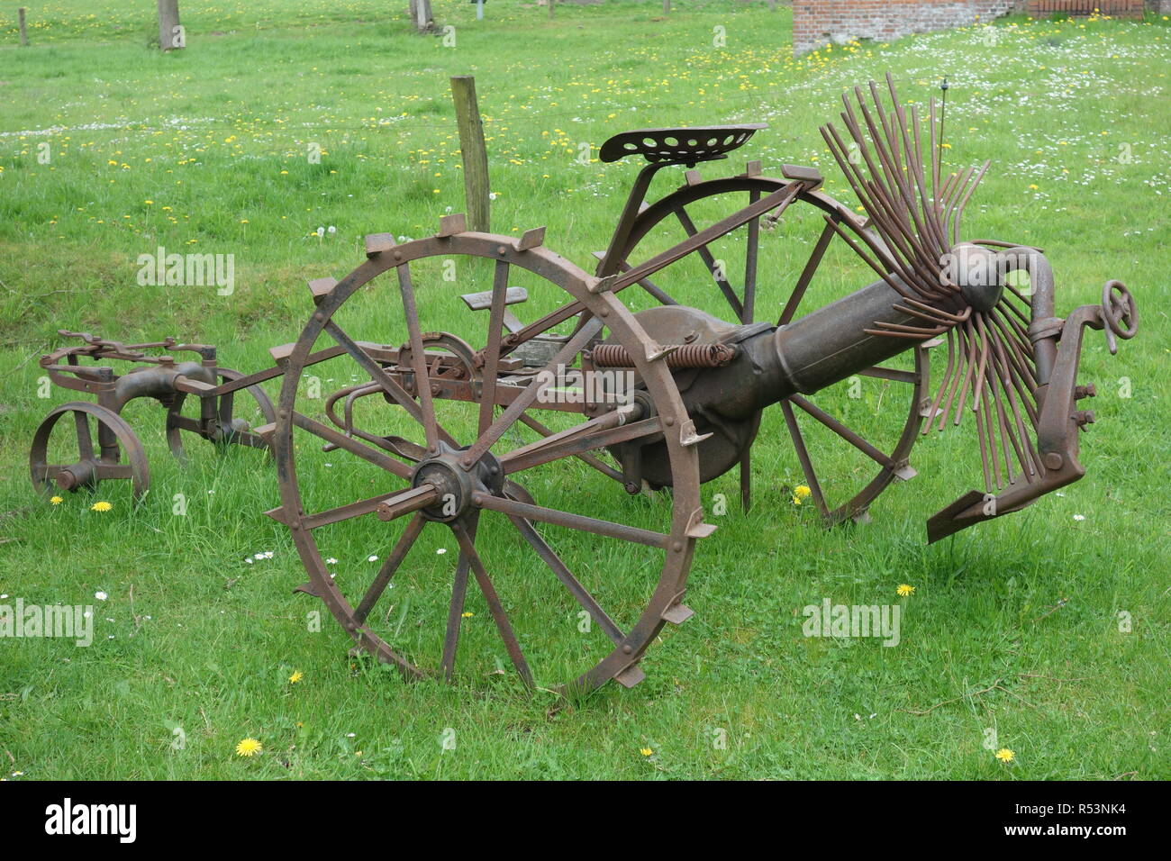 historic hay tedder Stock Photo - Alamy