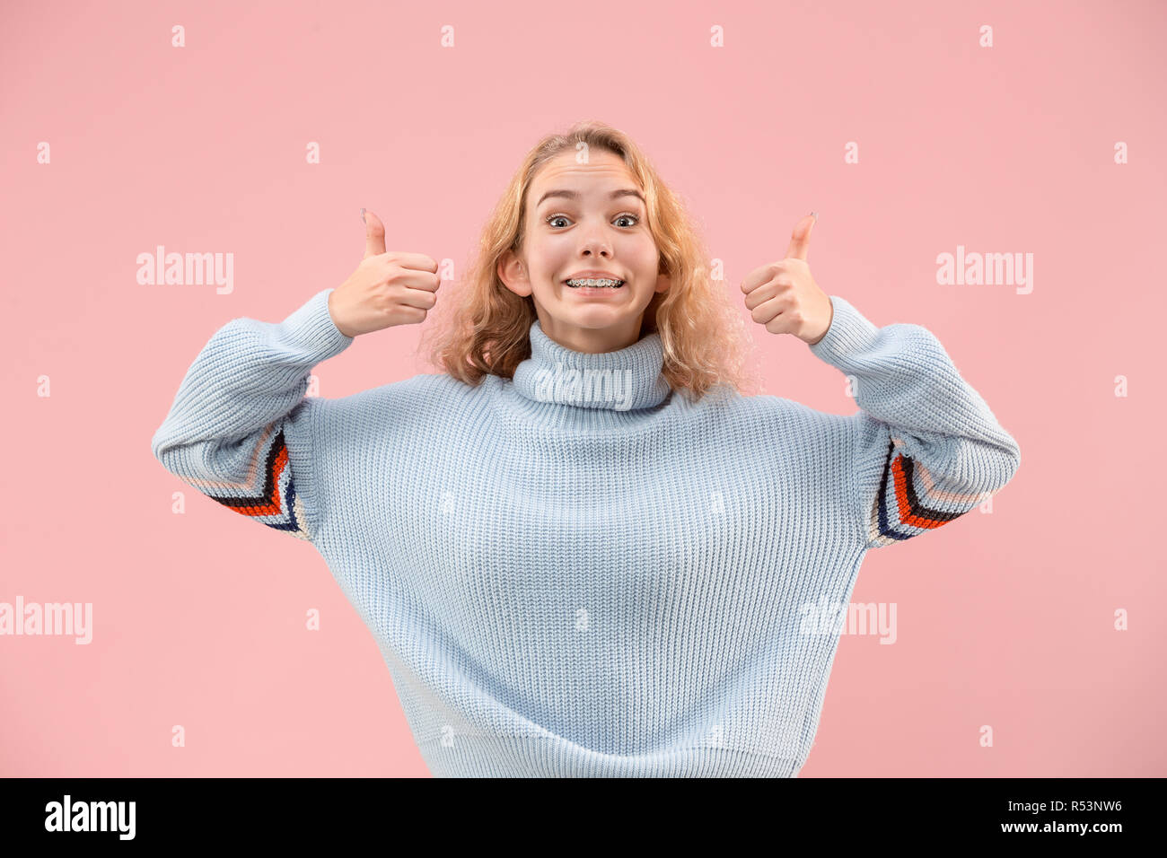I am ok. Happy woman, sign ok, smiling, isolated on trendy pink studio ...