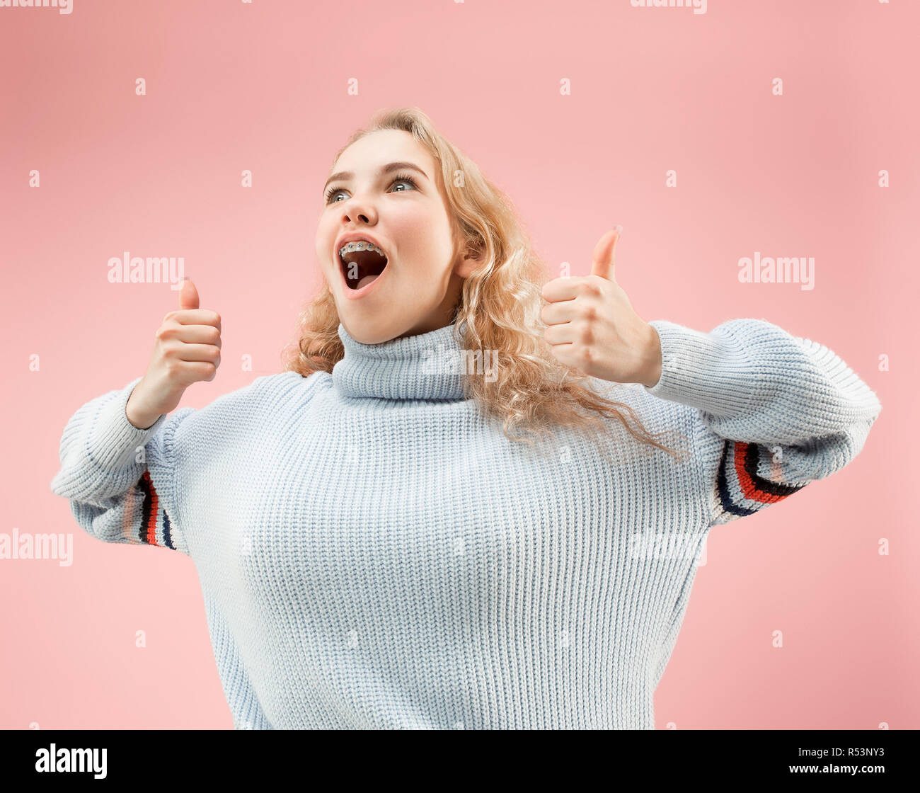 I am ok. Happy woman, sign ok, smiling, isolated on trendy pink studio ...