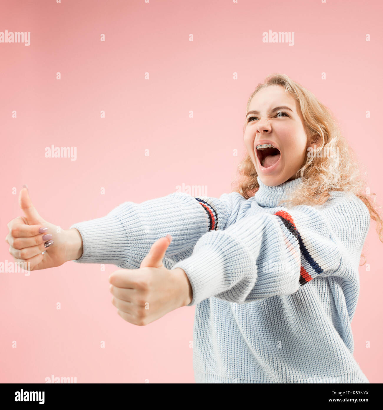 I am ok. Happy woman, sign ok, smiling, isolated on trendy pink studio ...
