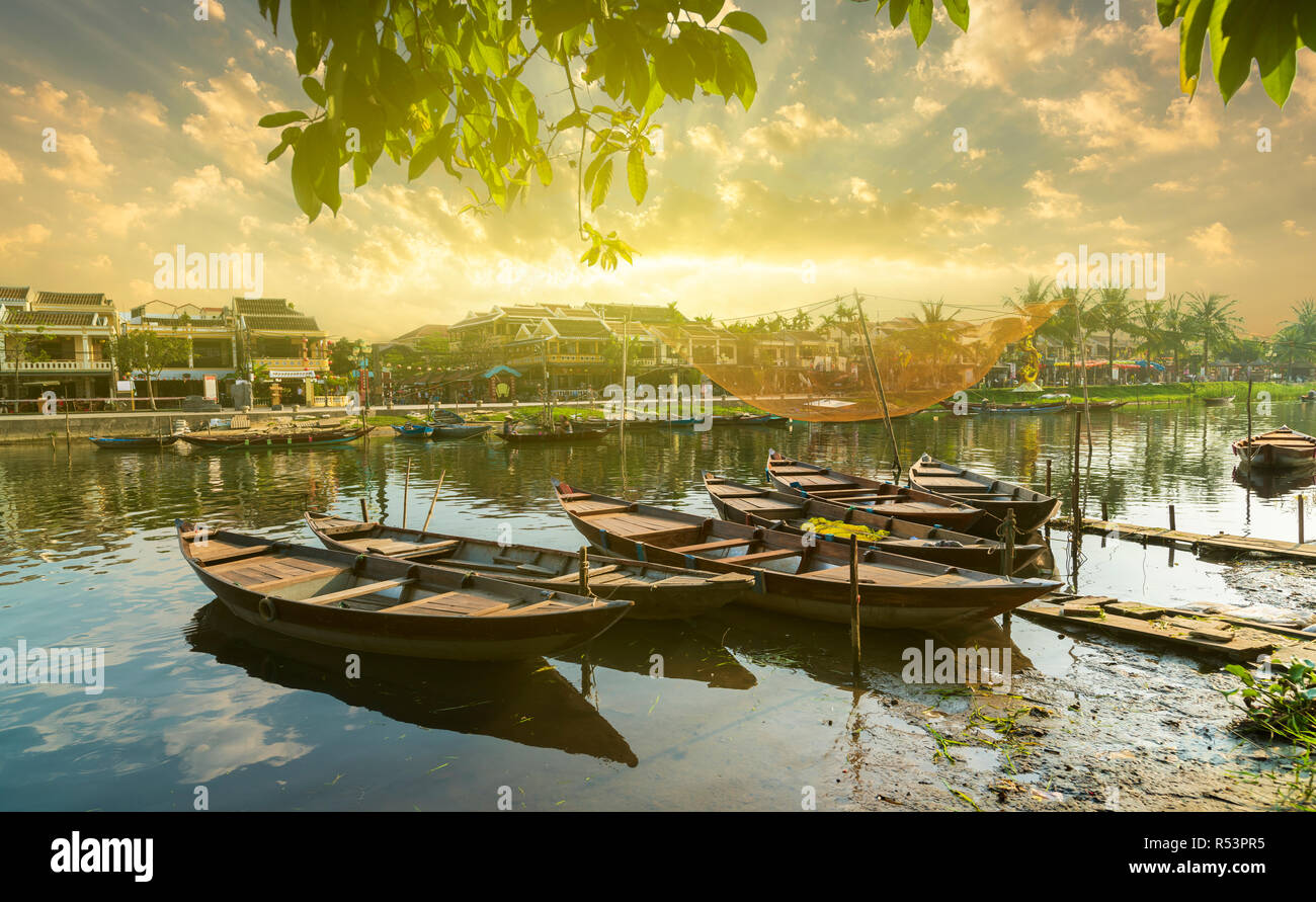 Wooden boats on the Thu Bon River in Hoi An Ancient Town, Vietnam Stock ...