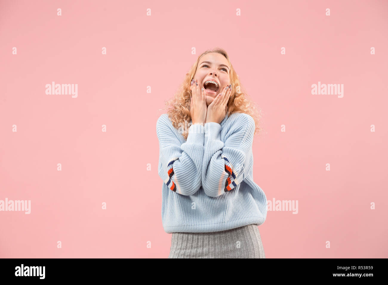 Happy business woman standing, smiling isolated on trendy pink studio ...