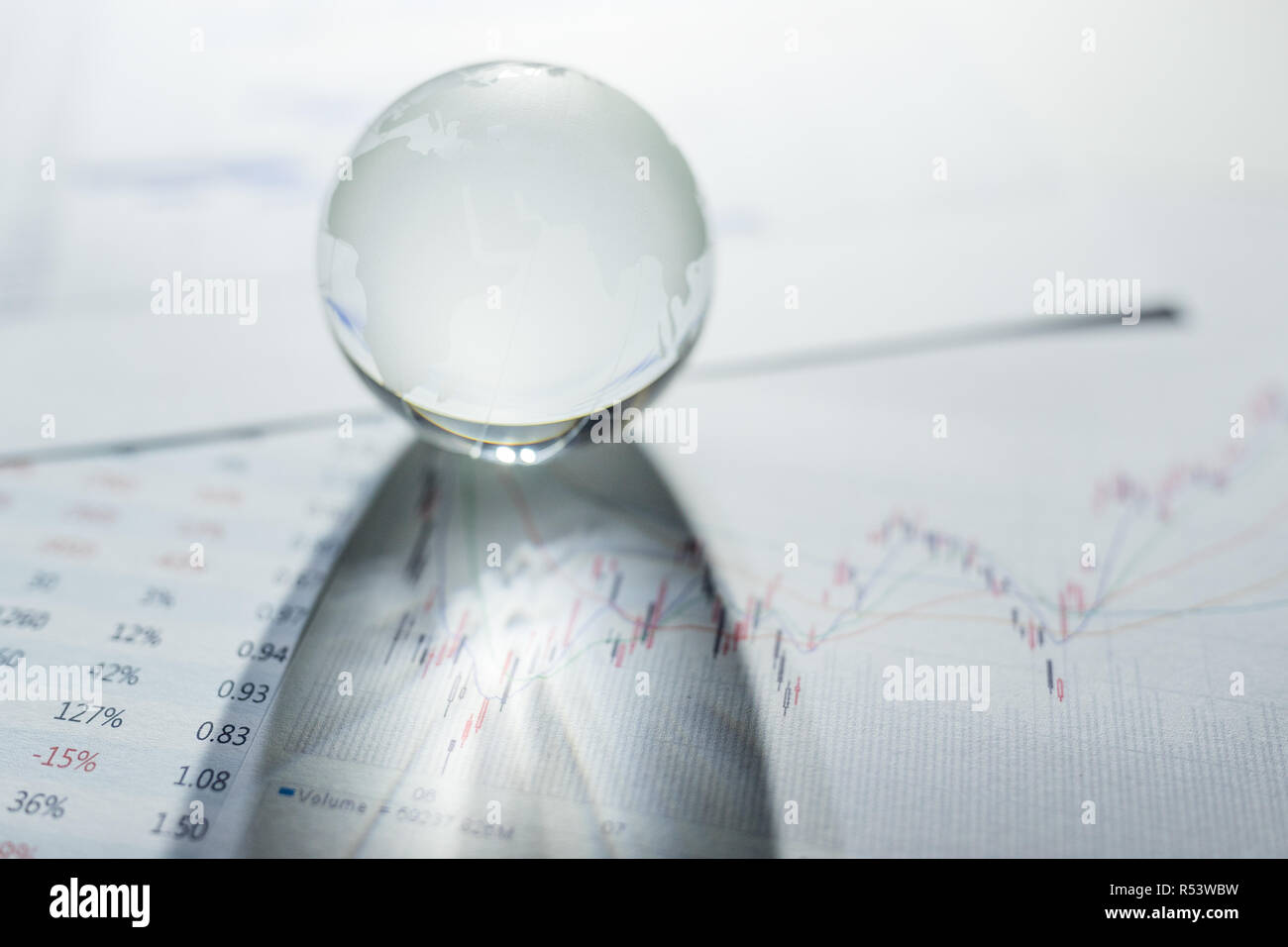 Glass globe on the chart paper Stock Photo - Alamy