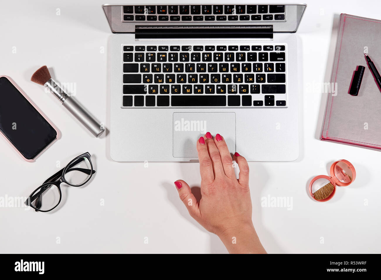 working hours. secretary typing a document at work Stock Photo - Alamy