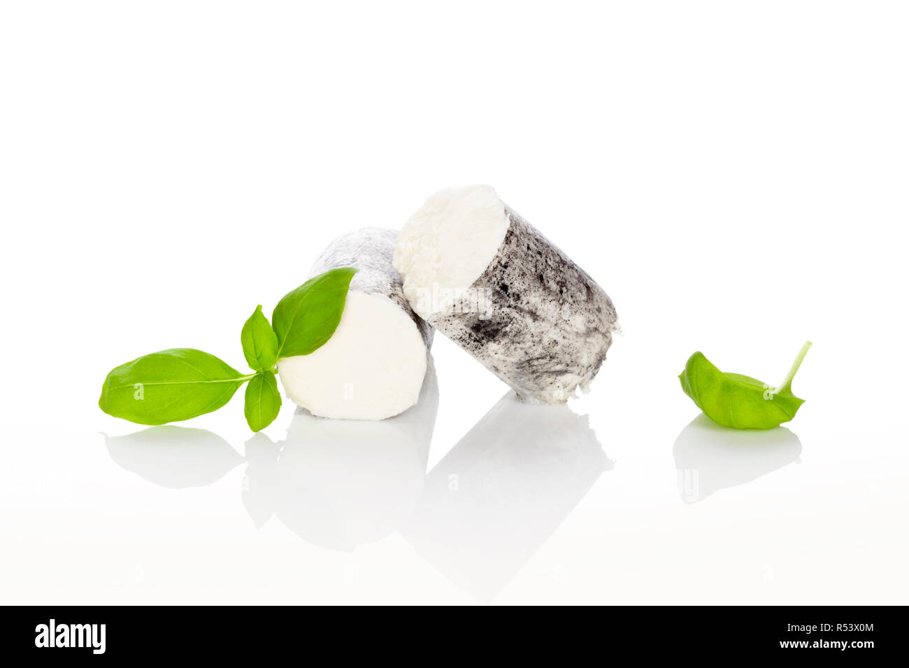 Goat cheese with basil Stock Photo - Alamy