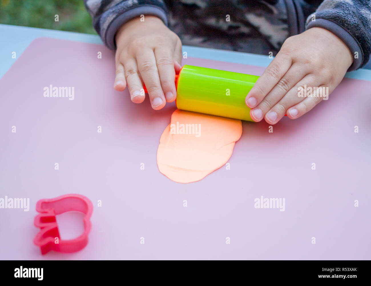 Boy play plasticine hi-res stock photography and images - Alamy