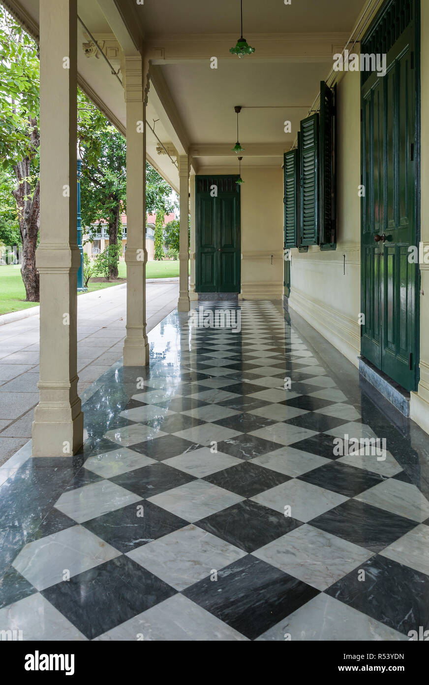 Small terrace with the marble tile floor of the old vintage house ...