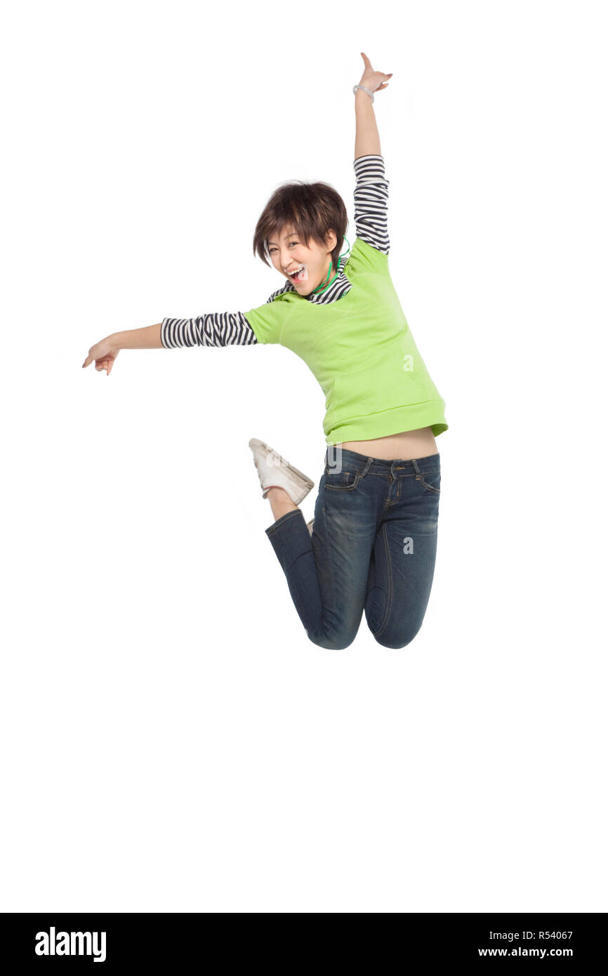 An excited woman jumping Stock Photo - Alamy