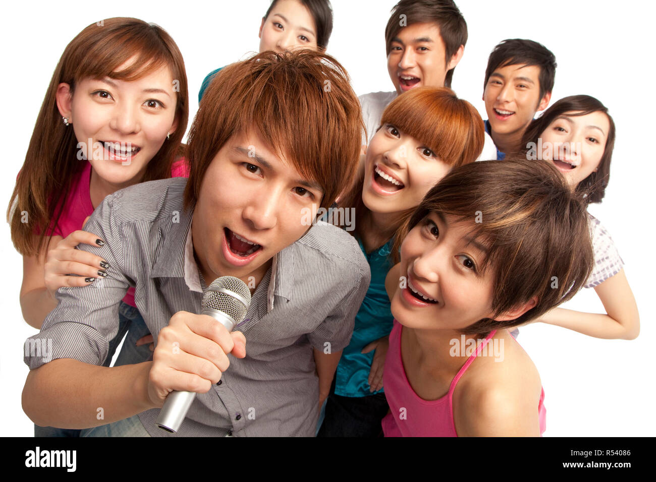 A group of young people singing Stock Photo - Alamy