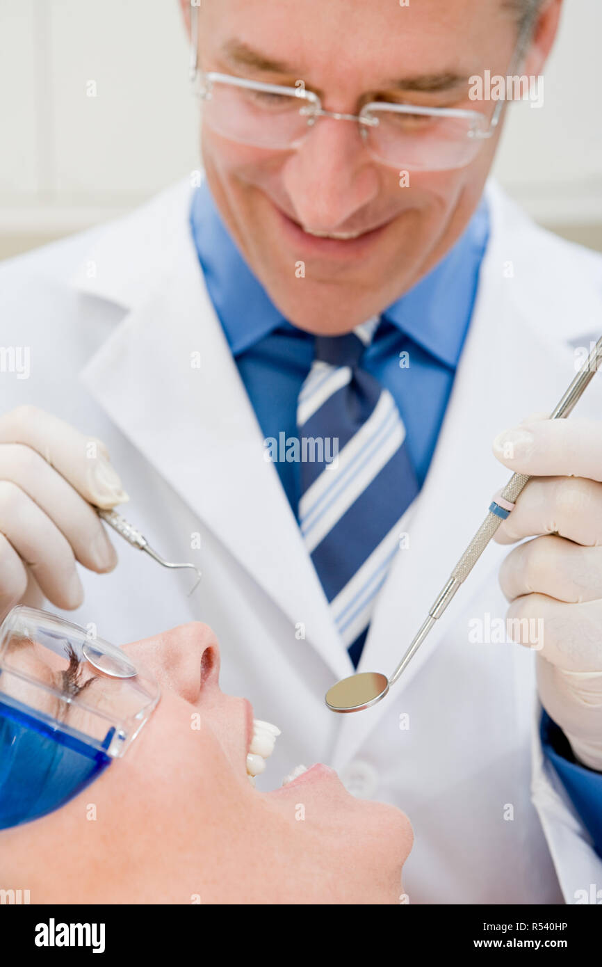 Portrait patient dentist laughing hi-res stock photography and images ...