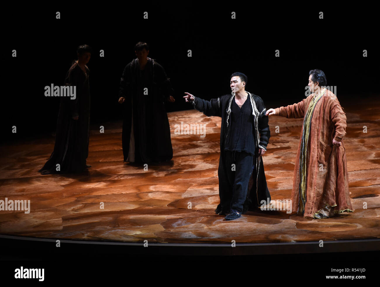 Beijing, China. 28th Nov, 2018. Actors Hu Jun (2nd R) and Pu Cunxin ...
