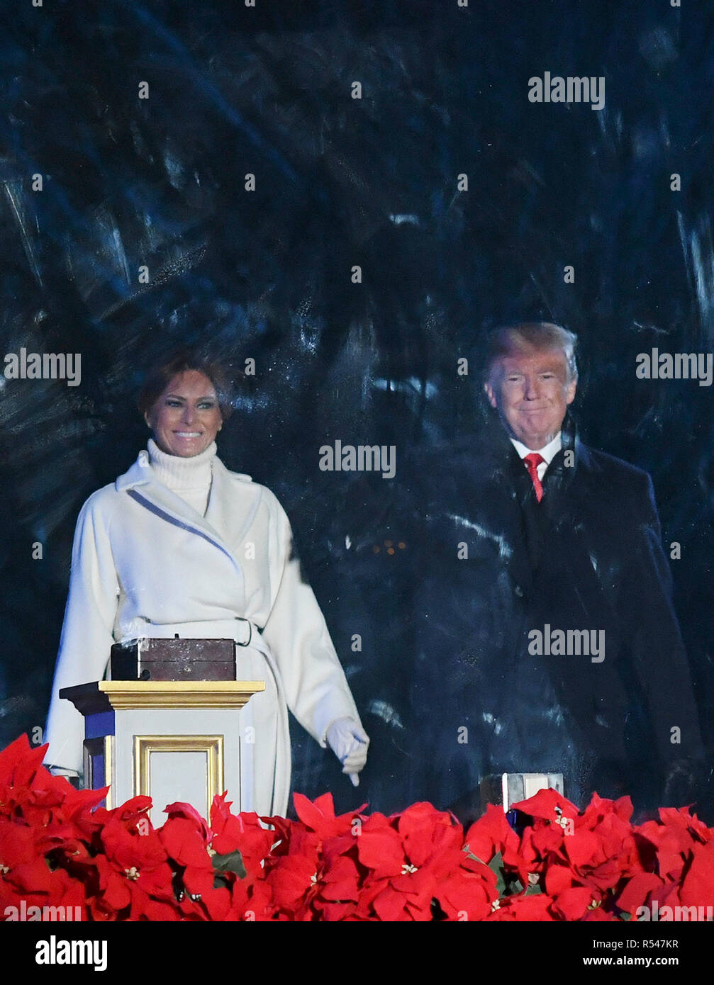 U.S President Donald Trump, joined by First Lady Melania Trump, during ...