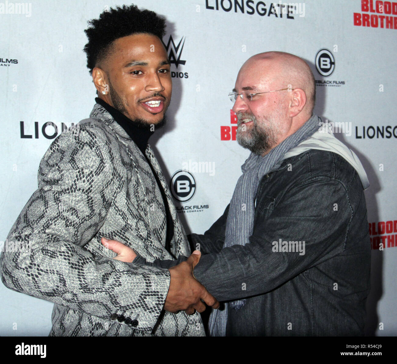 New York, USA. November 29, 2018Trey Songz, John Pogue, attend ...