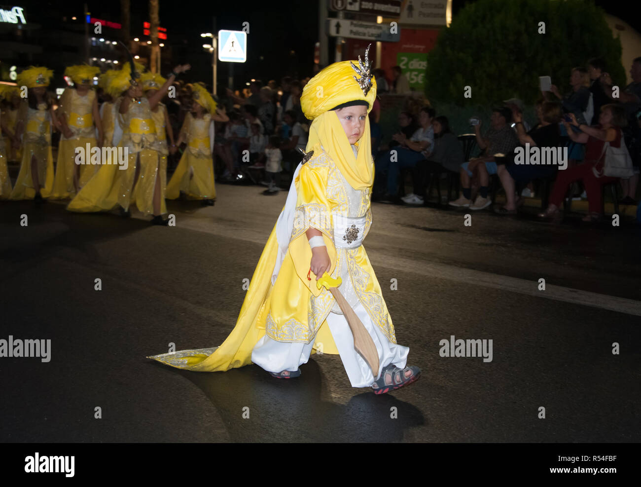 A young boy marching in costume at the Moors and Christians Festival ...