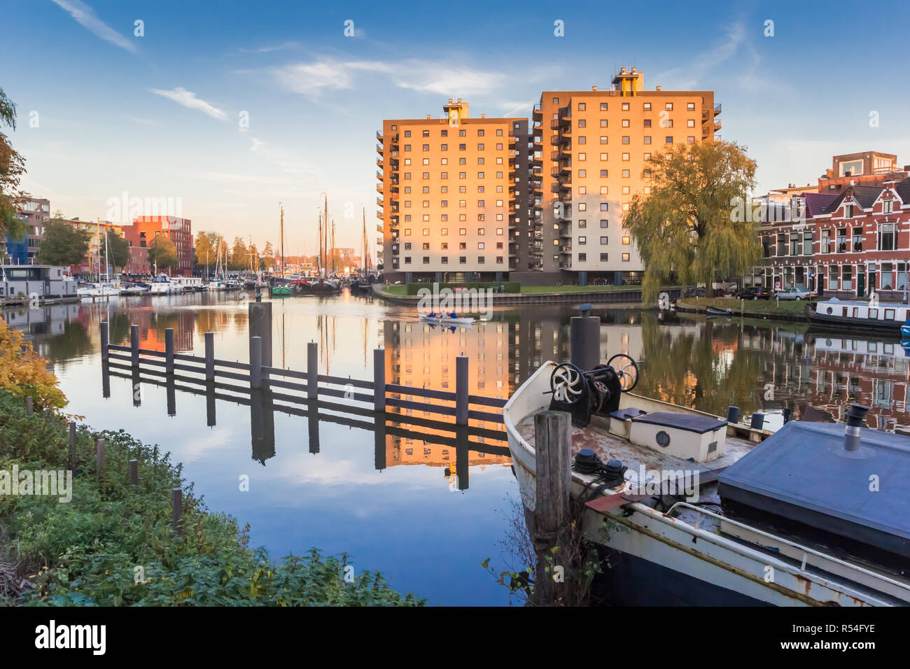 Sunset at the Oosterhaven harbor in historic city Groningen, The ...