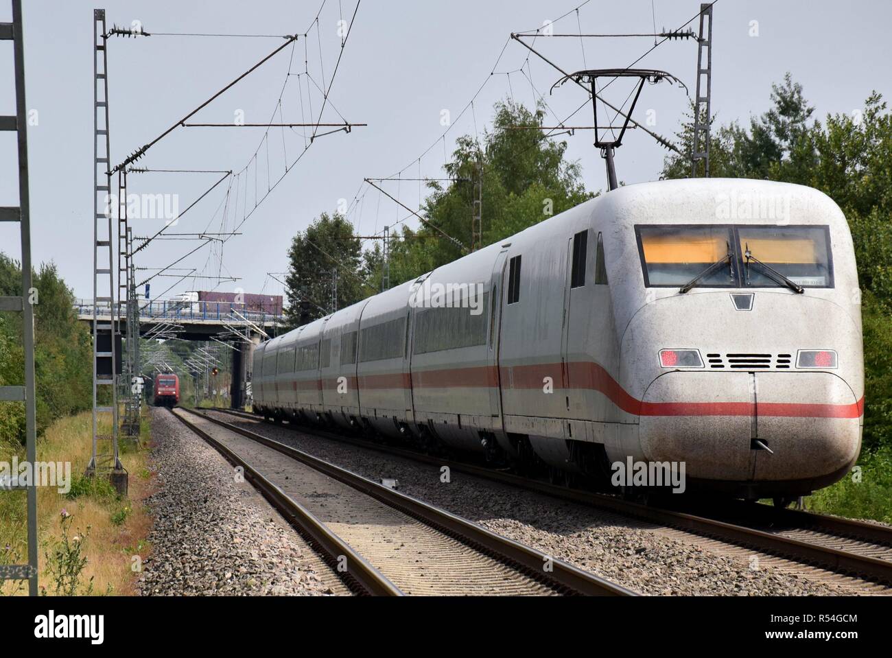 A railway line with Intercity-Express, Regional-Express and a highway ...