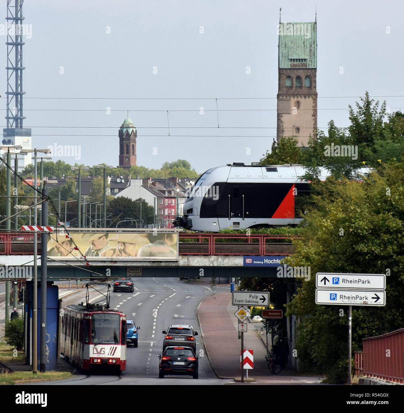 A railway line with passenger train connected with tram on 16.08.2018 ...