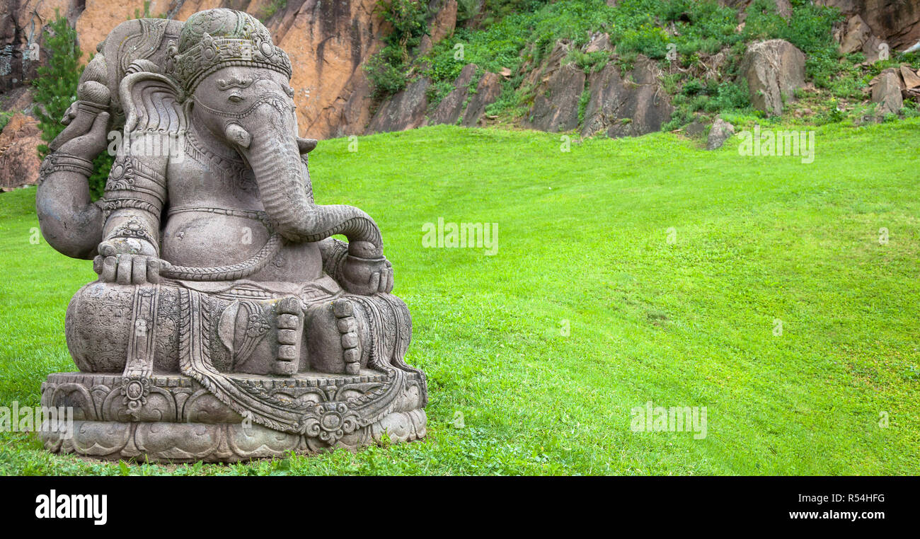 Ganesha statue in a beautiful mountain garden Stock Photo - Alamy
