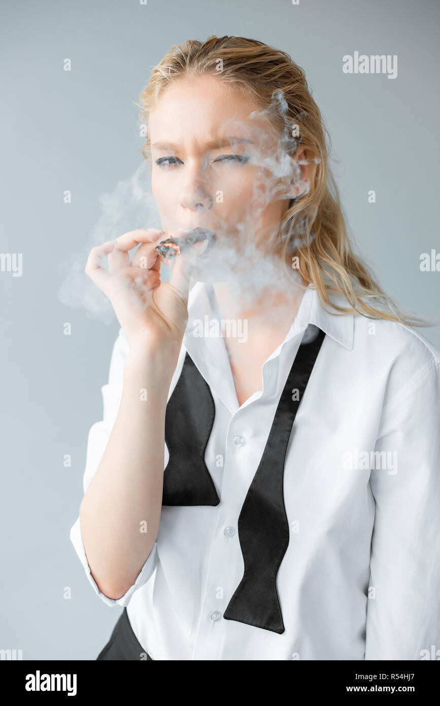 Blonde girl smoking hi-res stock photography and images - Alamy