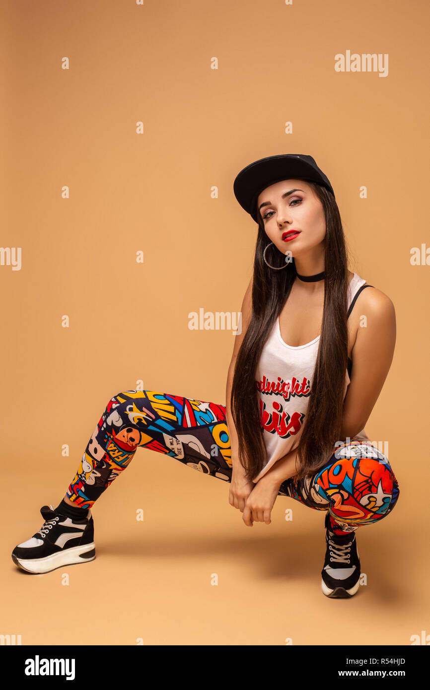 Young female dancer on studio background. Young modern style dancer ...