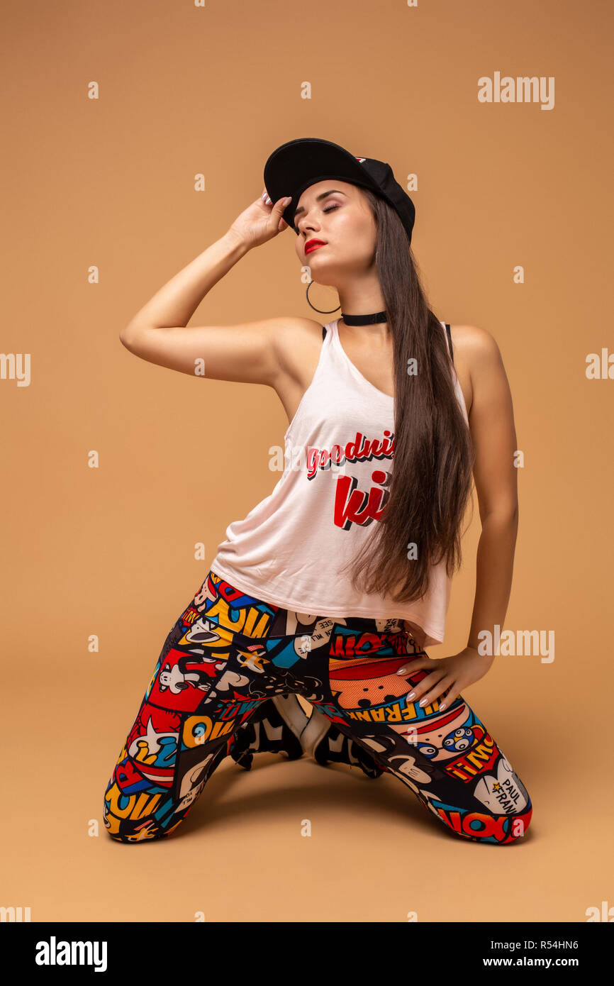 Young female dancer on studio background. Young modern style dancer ...