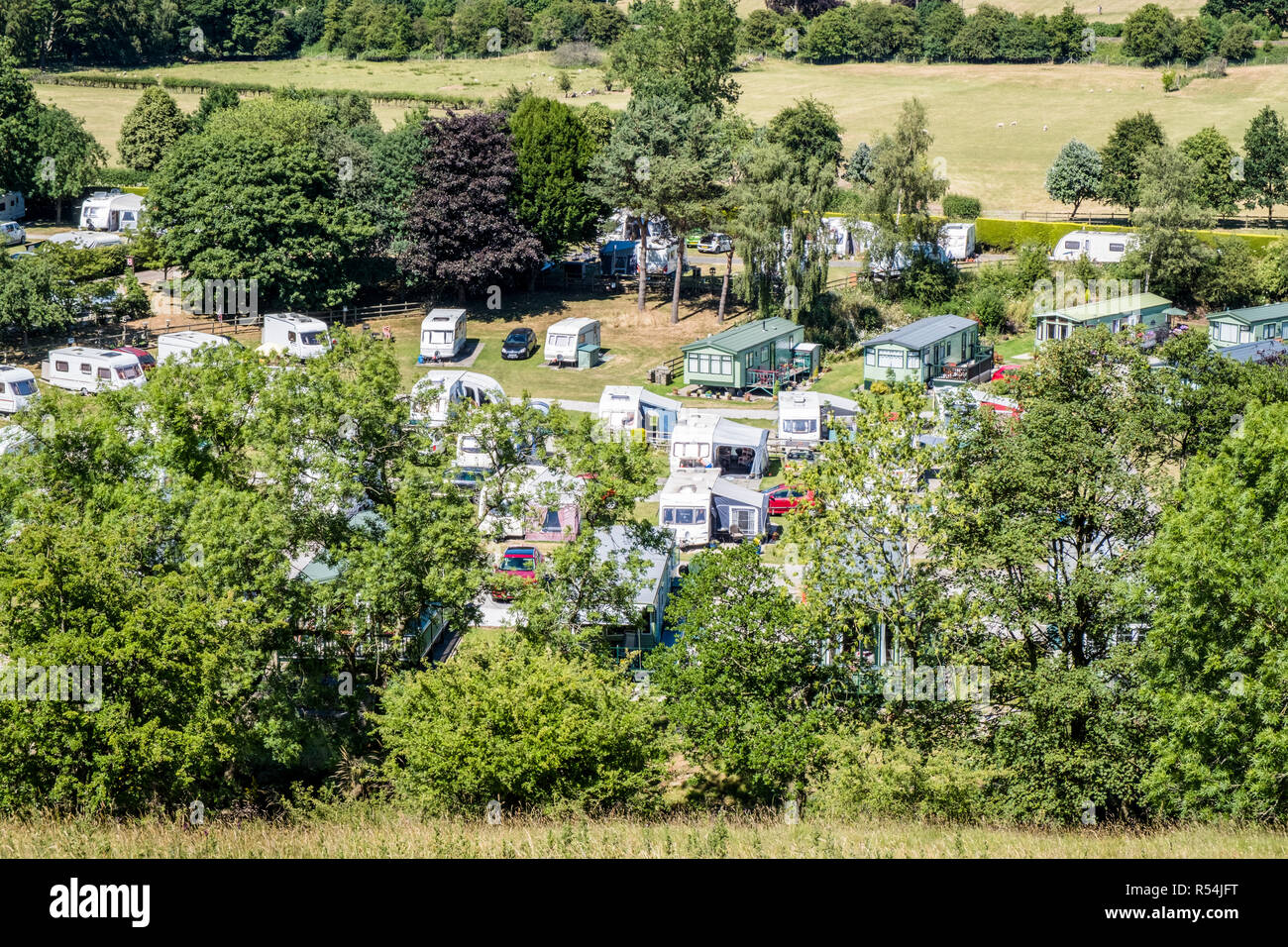 Caravans seen from above at a Caravan park near Hope, Derbyshire, Peak ...