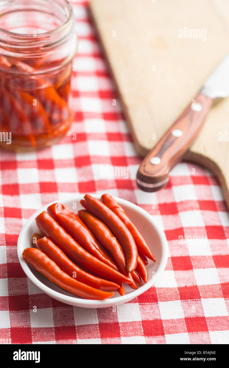 Pickled chili peppers Stock Photo - Alamy