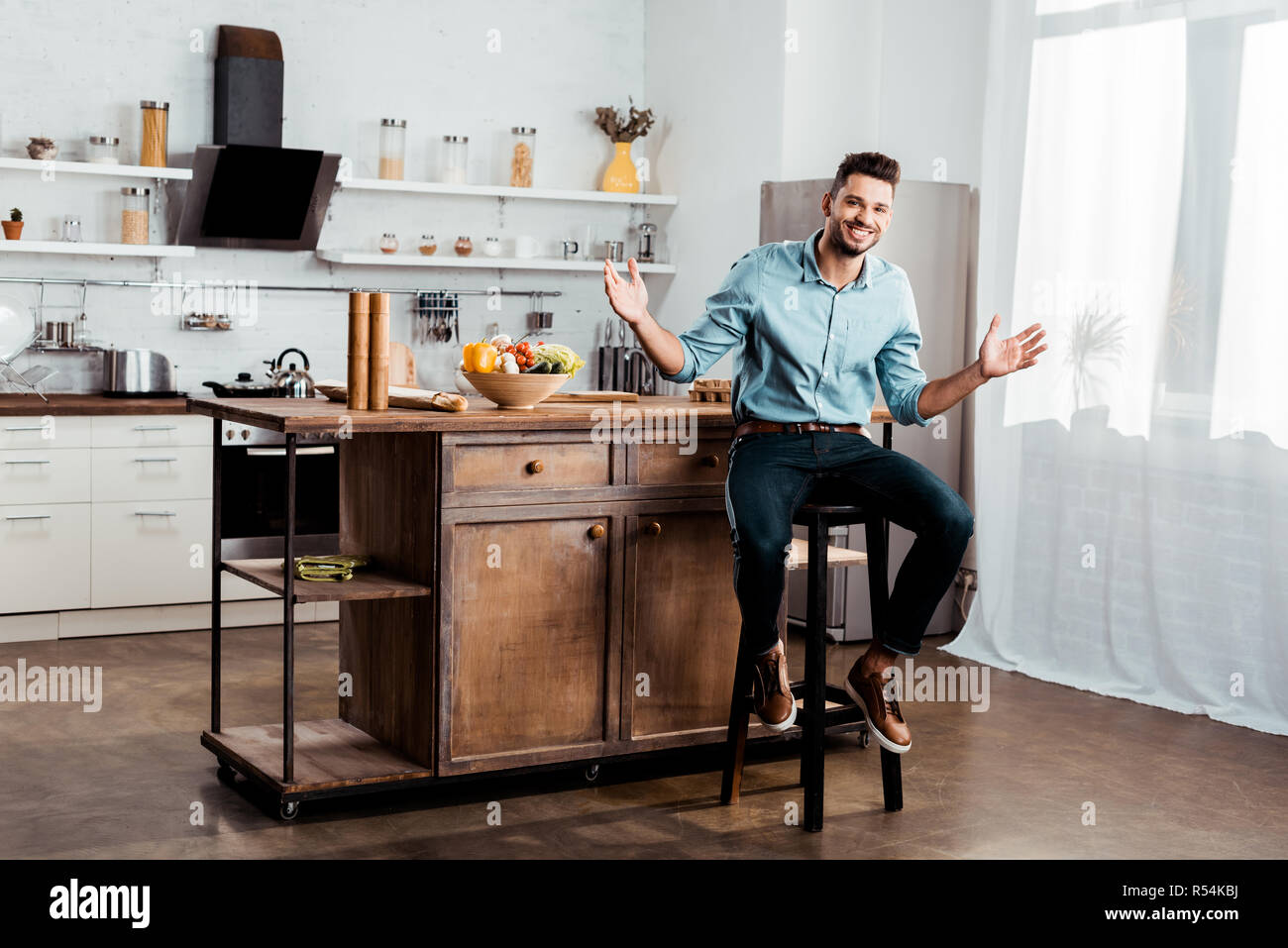 Sitting with open arms hi-res stock photography and images - Alamy