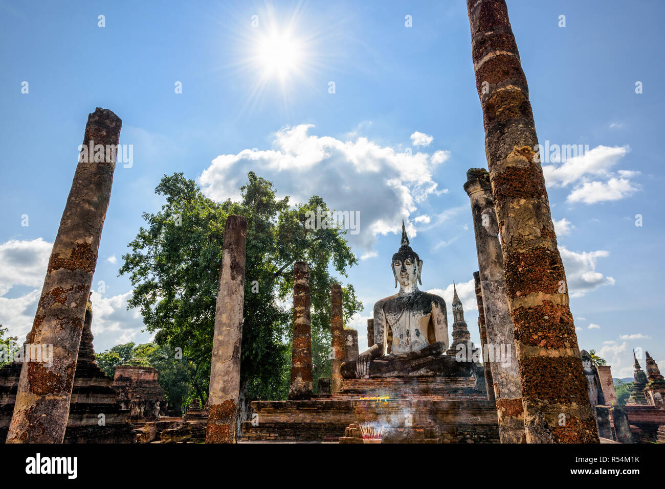 Buddha statue among the ruins Stock Photo - Alamy