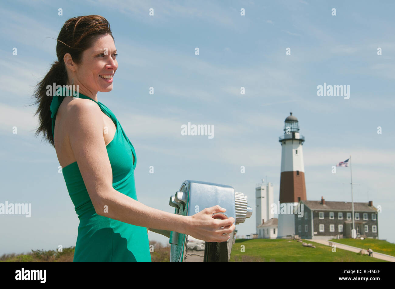 Woman on island lighthouse hi-res stock photography and images - Alamy