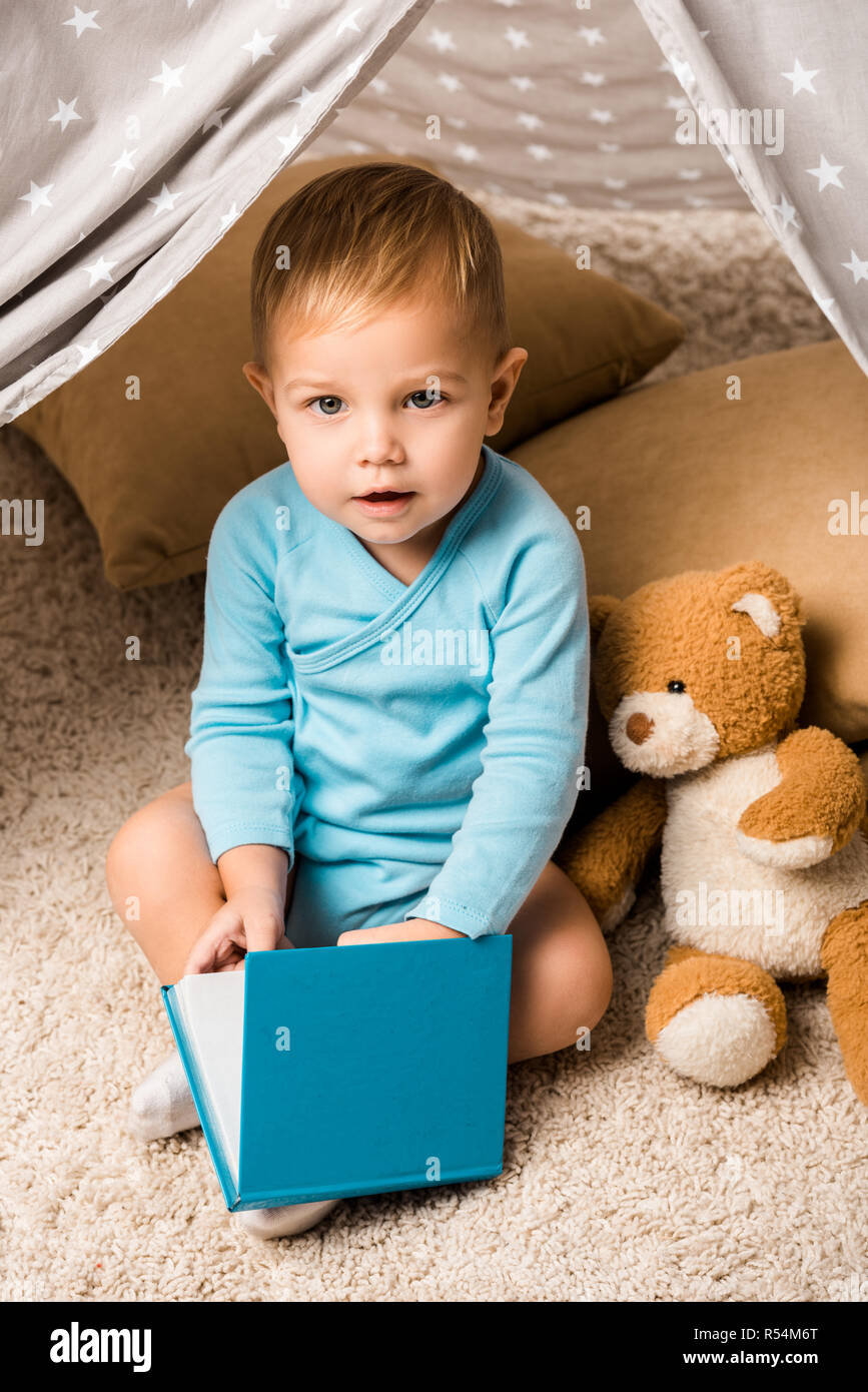 Child looking book cover hi-res stock photography and images - Alamy