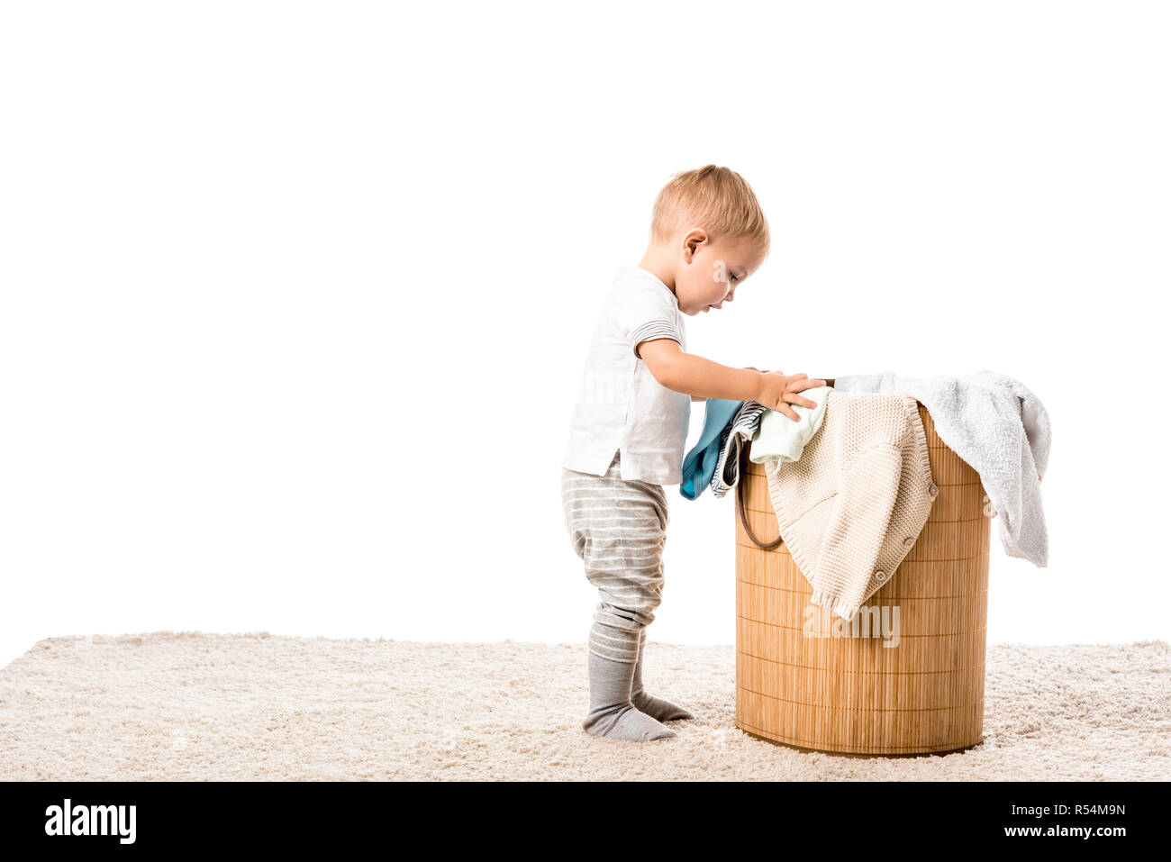 Baby in laundry basket isolated hi-res stock photography and images - Alamy