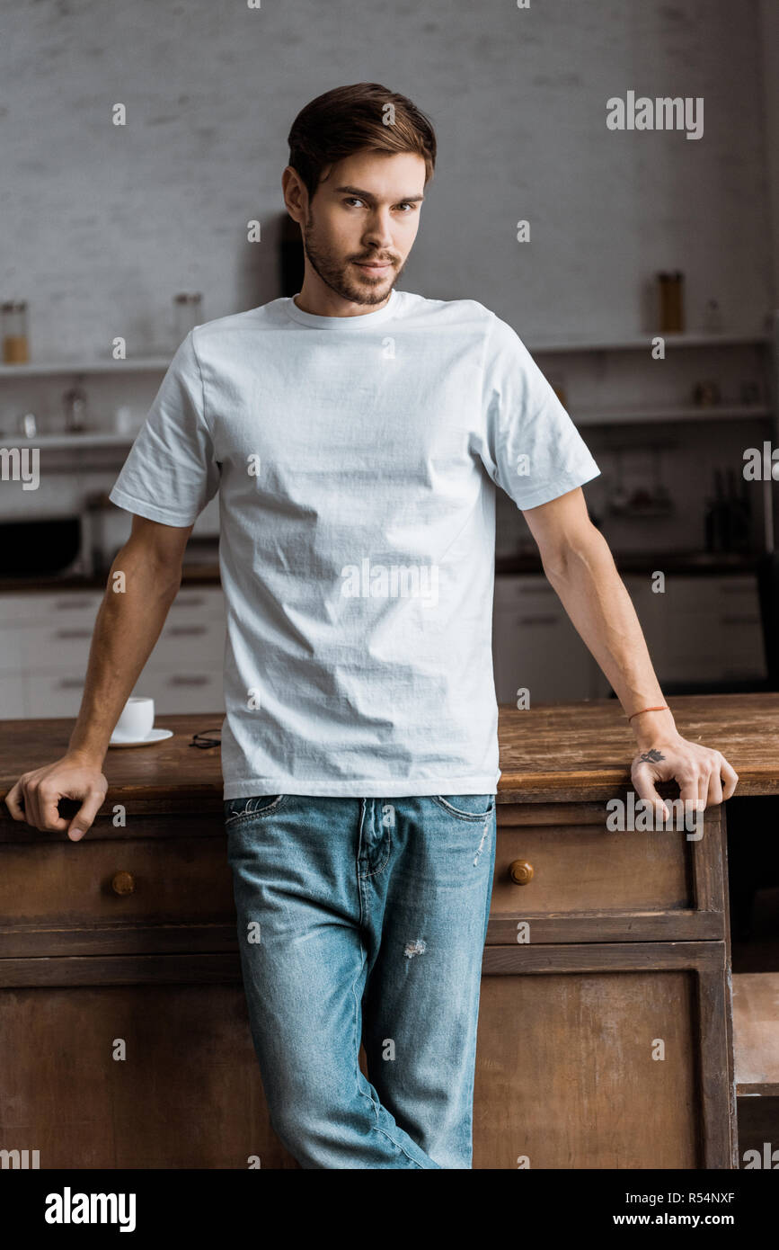 Young man leaning back hi-res stock photography and images - Alamy