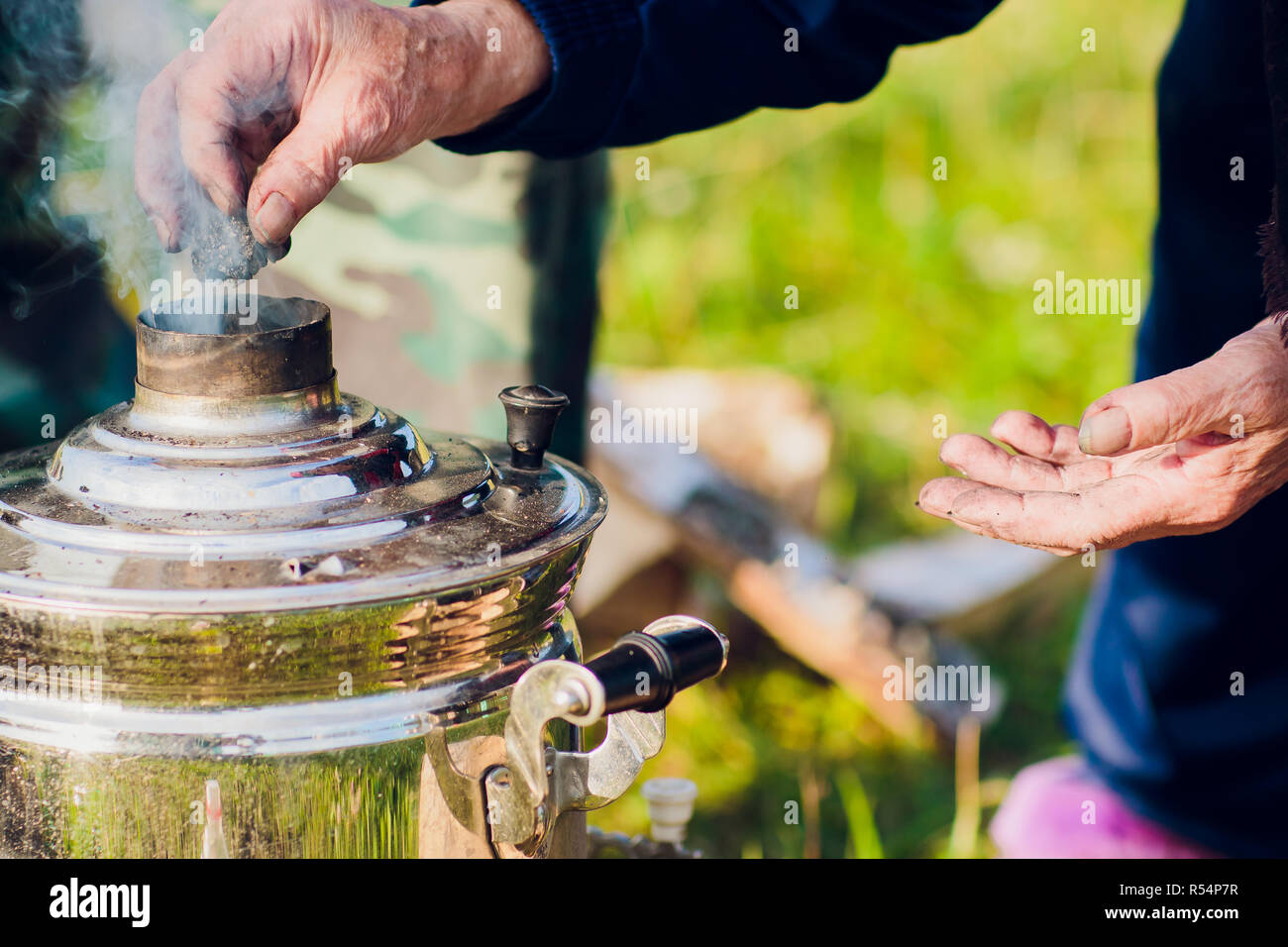 samovar. preparation tea. coal loading into furnace Stock Photo - Alamy