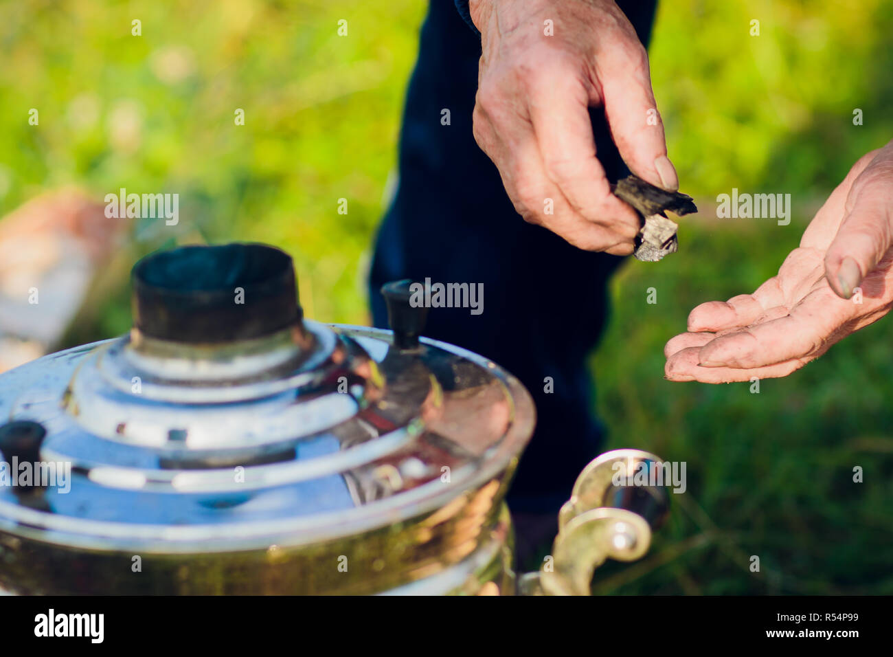 samovar. preparation tea. coal loading into furnace Stock Photo - Alamy