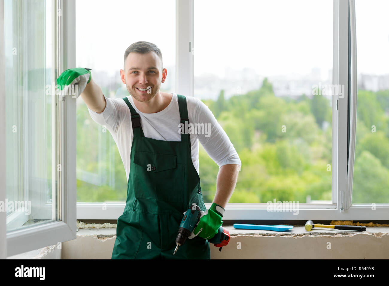 Portrait of a handsome workman Stock Photo - Alamy